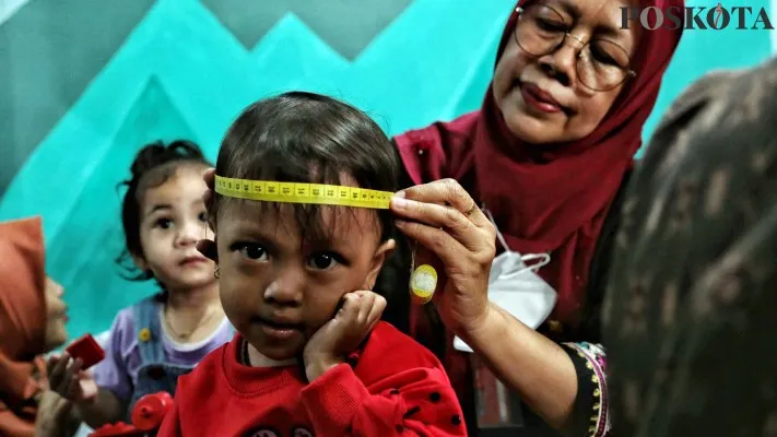 Pemeriksaan Kesehatan Balita di RPTRA Rorotan Indah - poskota.co.id